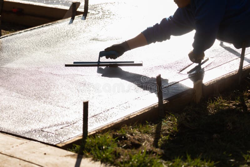 Construction Worker Smoothing Wet Cement with Trowel Tools Stock Image ...