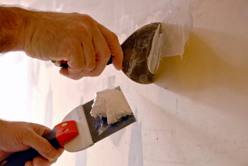 Construction Worker Spackling New Wall with Knife Stock Photo - Image ...