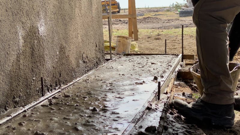 Construction Worker Spreading Cement Stock Video - Video of house ...