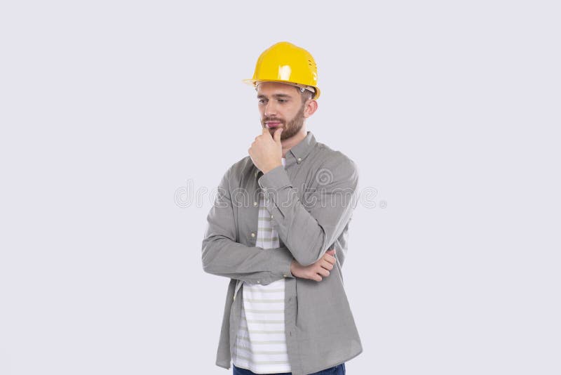 Construction Worker Standing Thinking. Architect Analysing Work. Man ...