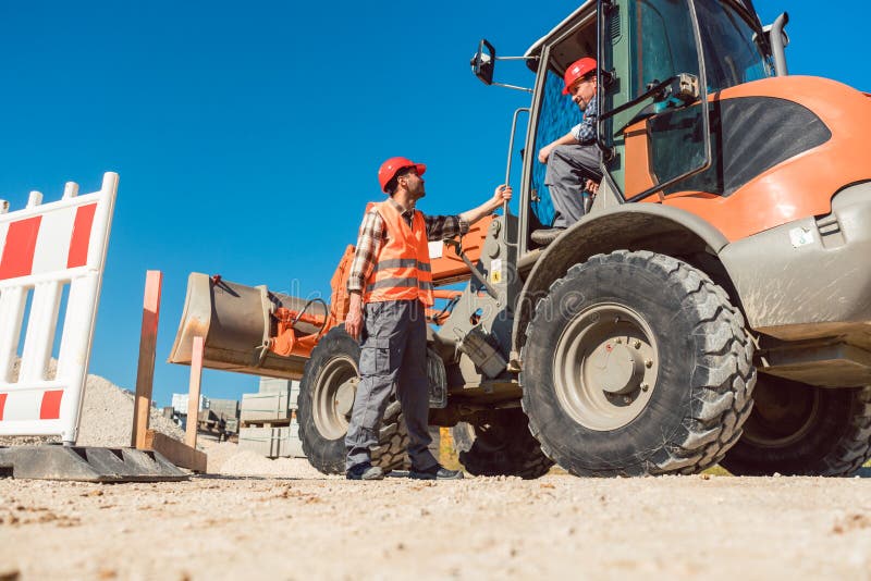 Construction Worker Starting Road Works on Site Stock Photo - Image of ...