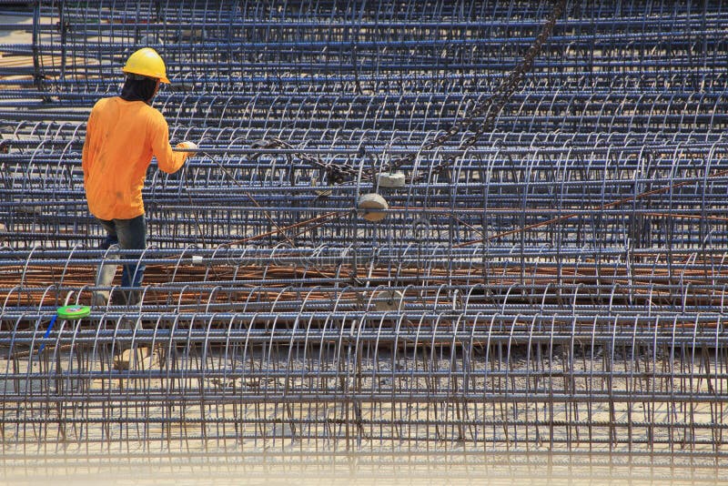 Construction Worker and Working in the Construction Area of â€‹â€‹tall ...