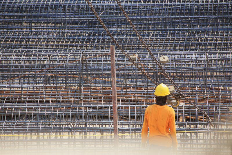 Construction Worker and Working in the Construction Area of â€‹â€‹tall ...
