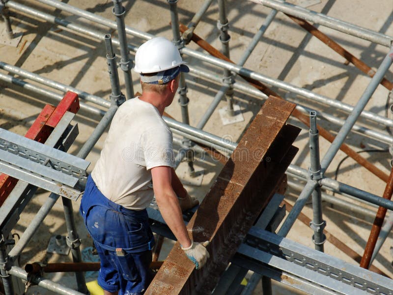 Construction Worker with Steel Beam Stock Image - Image of platform ...