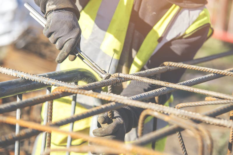 Construction Worker Steel Fixer Working at the Building Site Close-up ...