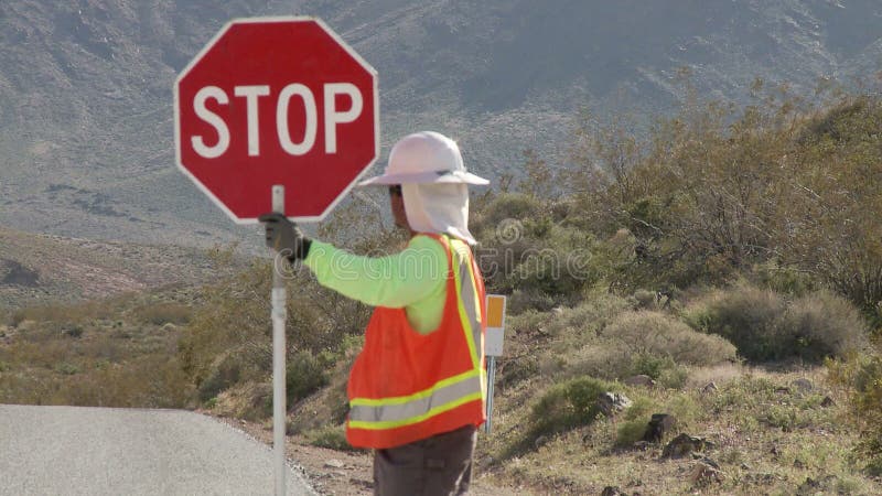 Stop Sign Half Buried in Snow As People Wait at Crowded Bus Station ...