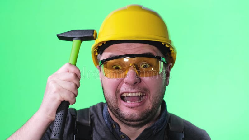 Portrait of a Construction Worker with a Protective Mask Looking at the ...