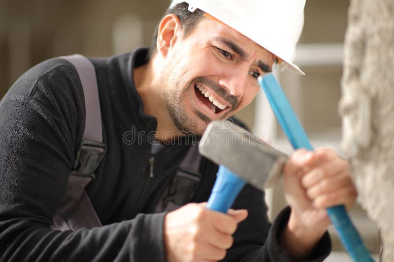 Construction Worker Suffering Accident Hiting Hand with Hammer Stock ...