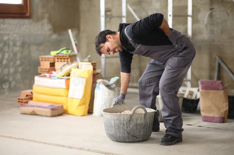 Construction Worker Suffering Back Ache and Complaining Stock Image ...