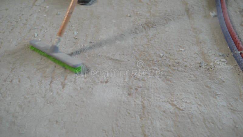 Construction Worker Sweeping Dust and Debris on Concrete Floor Stock ...