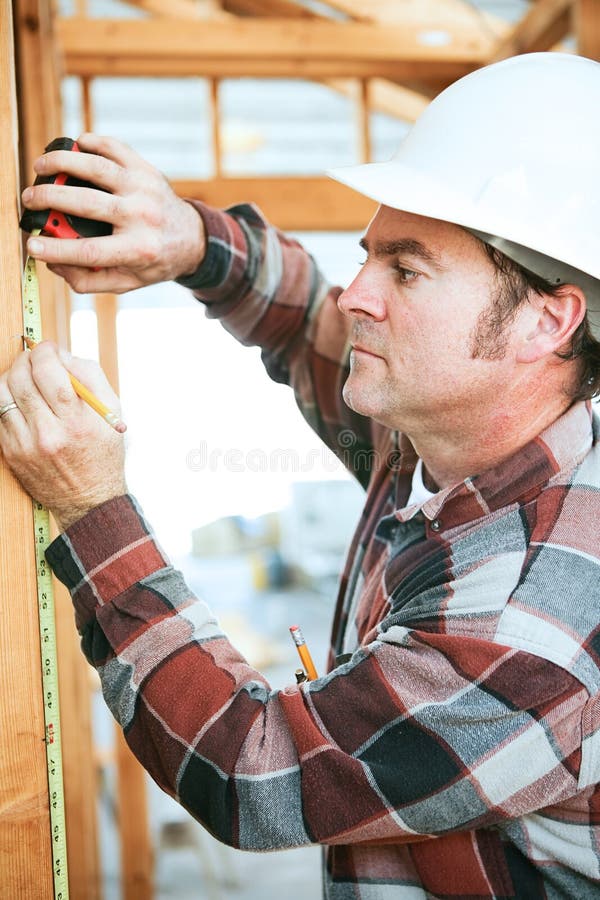 Carpenter Taking Measurements Stock Photo - Image of installing, plank ...