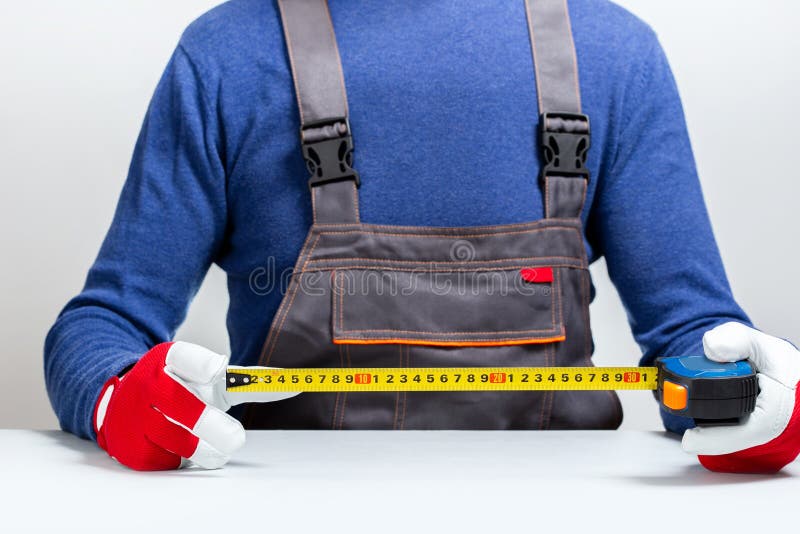 Construction Worker Takes Measuring. Stock Image - Image of person ...