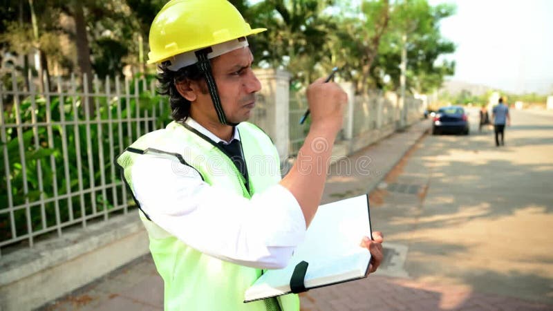 Construction Worker Taking Notes Stock Footage - Video of standing ...