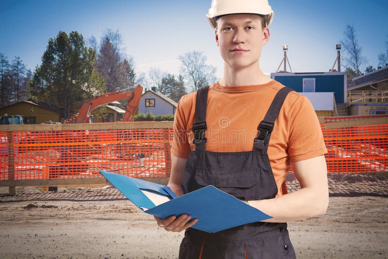 Construction Worker Taking Notes Stock Image - Image of coveralls ...