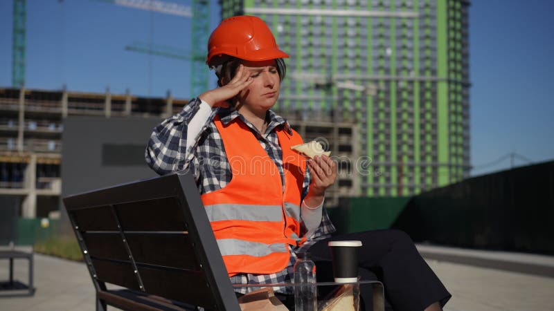 A Construction Worker is Taking a Well Deserved Break on His Work Site ...