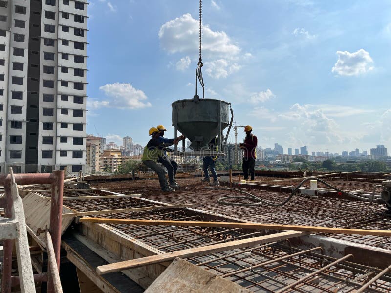 Construction Worker Team is Hard at Work on a Steel Structure in Kuala ...