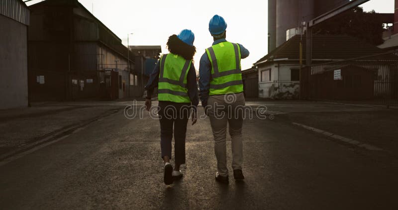 Construction Worker, Team and Walking with Back at Logistics Site in ...