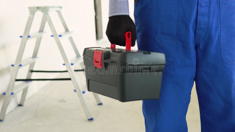 Construction Worker with Toolbox and Aluminum Ladder on Background at ...