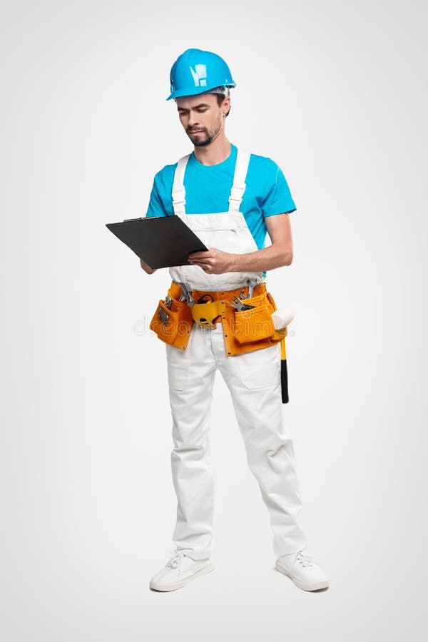 Construction Worker with Tools and Clipboard Stock Image - Image of ...