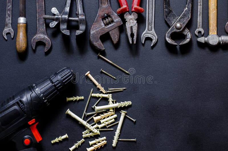 Construction Worker Tools on a Dark Background Top View Stock Image ...