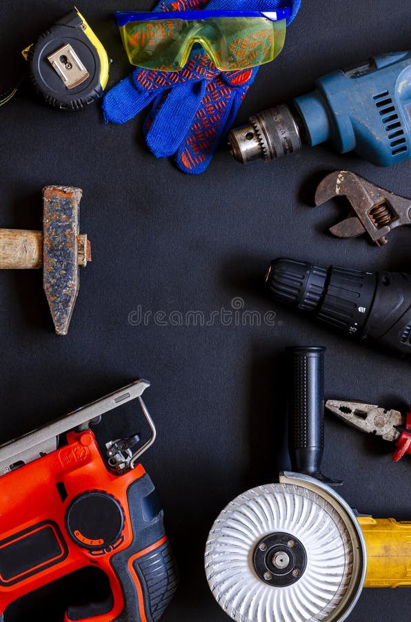Construction Worker Tools on a Dark Background Top View Stock Image ...