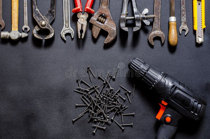 Construction Worker Tools on a Dark Background Top View Stock Photo ...