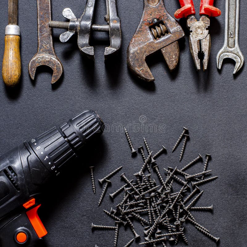 Construction Worker Tools on a Dark Background Top View Stock Photo ...