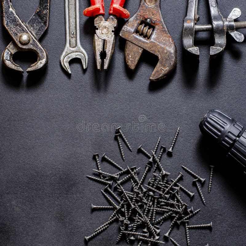 Construction Worker Tools on a Dark Background Top View Stock Photo ...