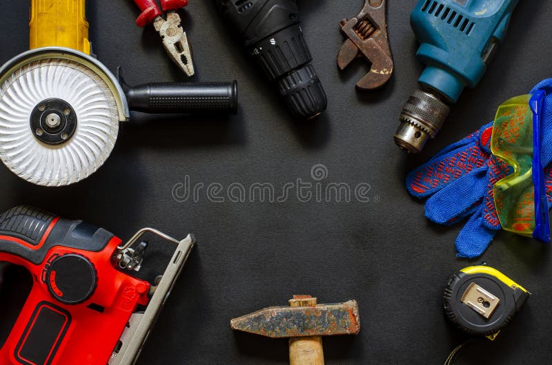 Construction Worker Tools on a Dark Background Top View Stock Image ...