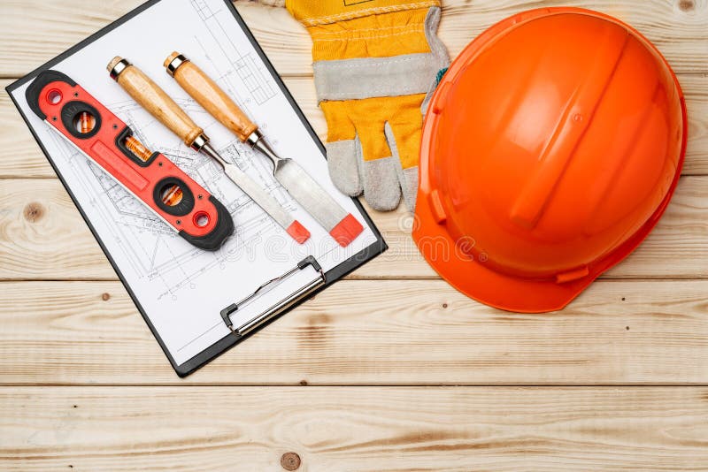 Construction Worker Tools Hardhat and Chisel on Wooden Background Stock ...