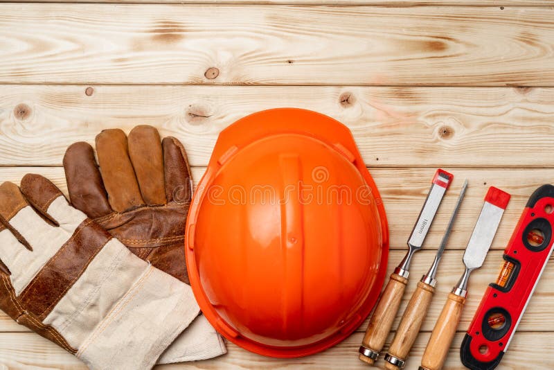 Construction Worker Tools Hardhat and Chisel on Wooden Background Stock ...