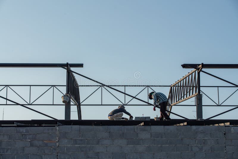 Construction Worker Two People Working Together Stock Image - Image of ...