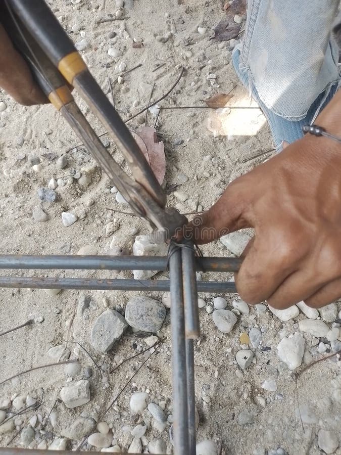 A Construction Worker is Tying Concrete Steel Stock Image - Image of ...