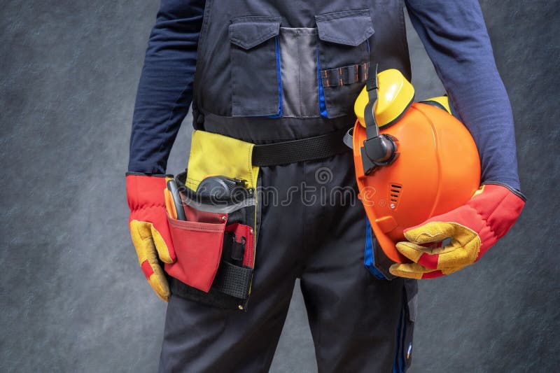 Construction Worker in Uniform Holding Safety Hard Hat. Stock Image ...