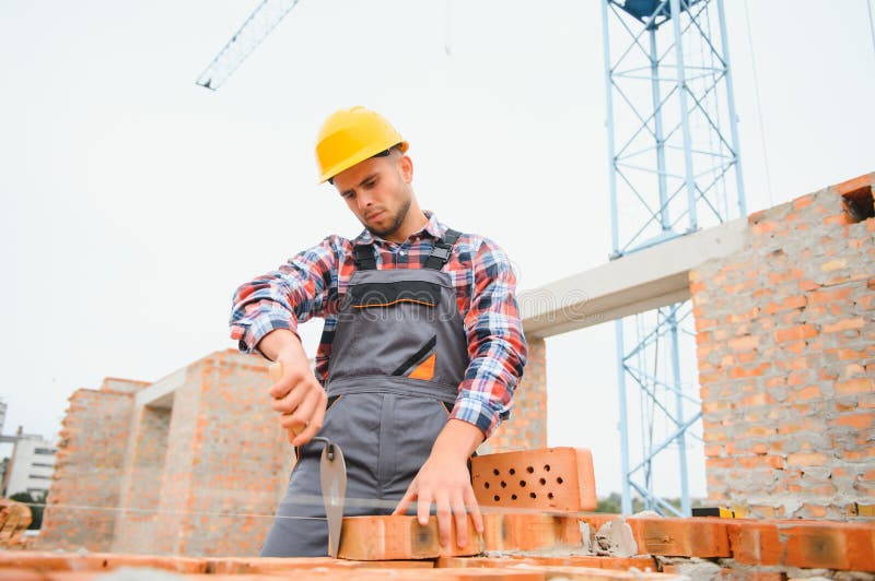 Construction Worker in Uniform and Safety Equipment Have Job on ...