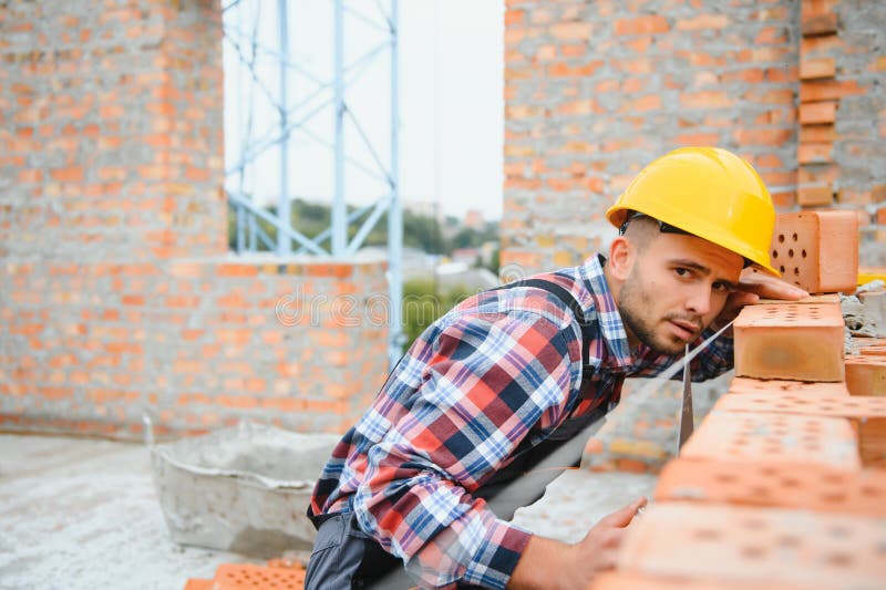 Construction Worker in Uniform and Safety Equipment Have Job on ...