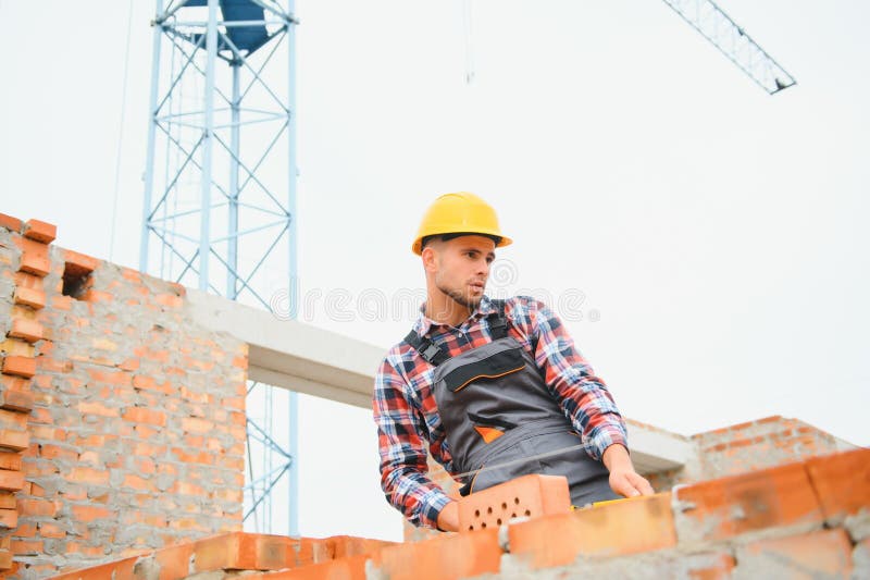 Construction Worker in Uniform and Safety Equipment Have Job on ...