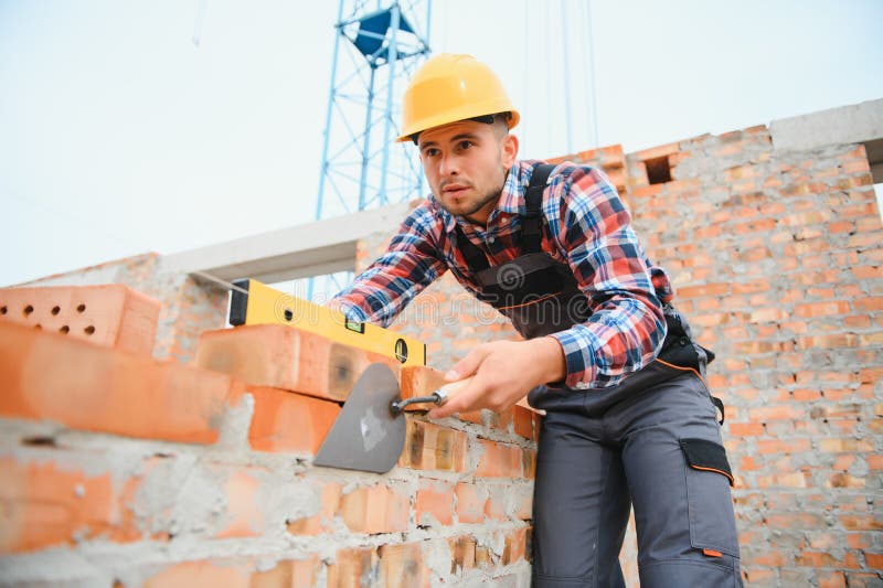 Construction Worker in Uniform and Safety Equipment Have Job on ...