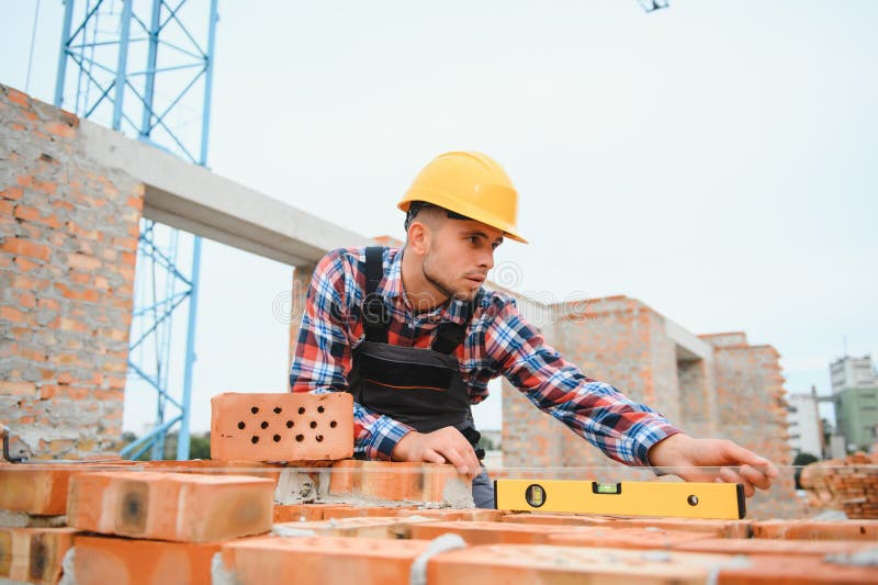 Construction Worker in Uniform and Safety Equipment Have Job on ...