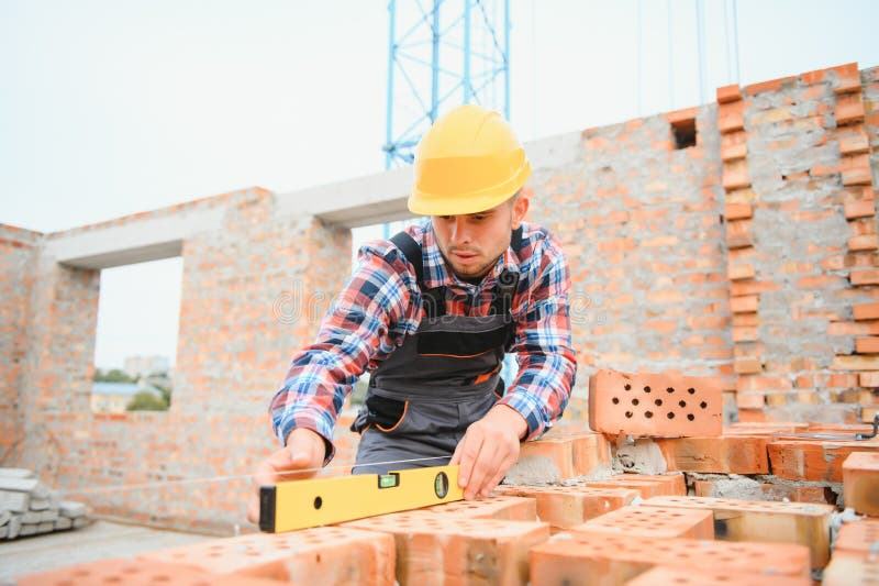 Construction Worker in Uniform and Safety Equipment Have Job on ...