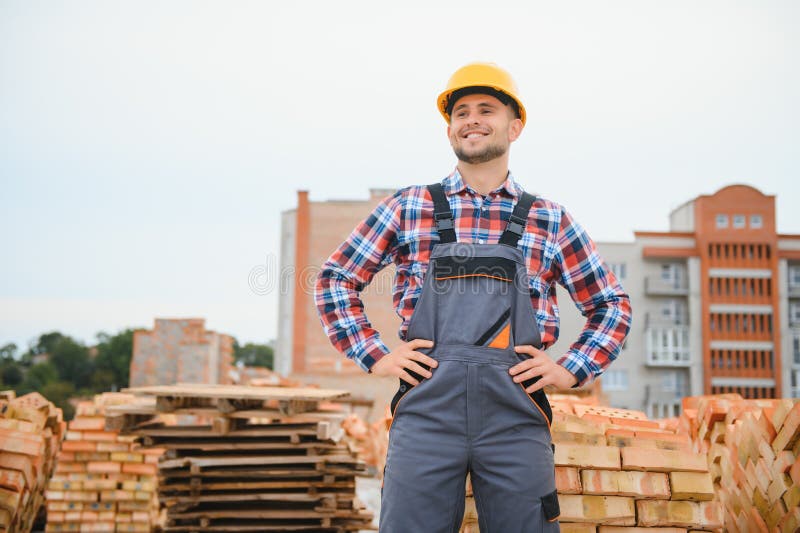 Construction Worker in Uniform and Safety Equipment Have Job on ...