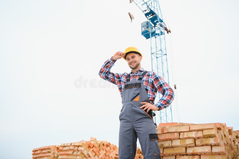 Construction Worker in Uniform and Safety Equipment Have Job on ...