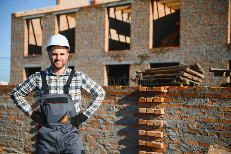Construction Worker in Uniform and Safety Equipment Have Job on ...