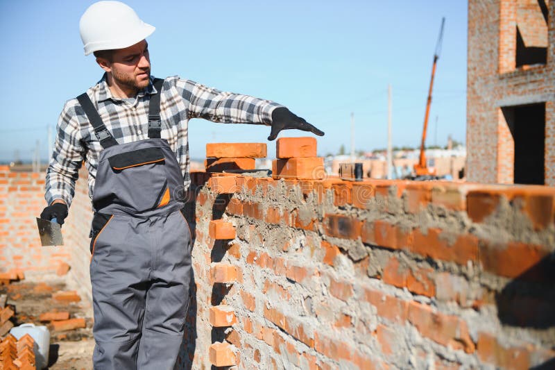Construction Worker in Uniform and Safety Equipment Have Job on ...