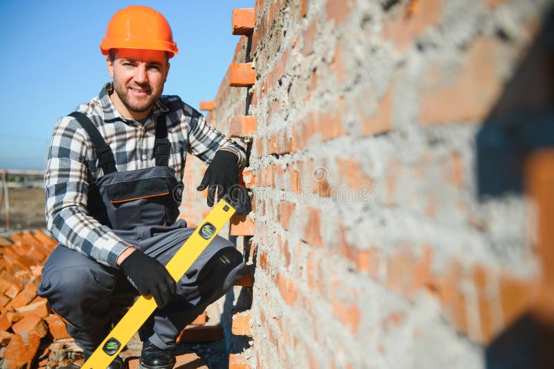 Construction Worker in Uniform and Safety Equipment Have Job on ...