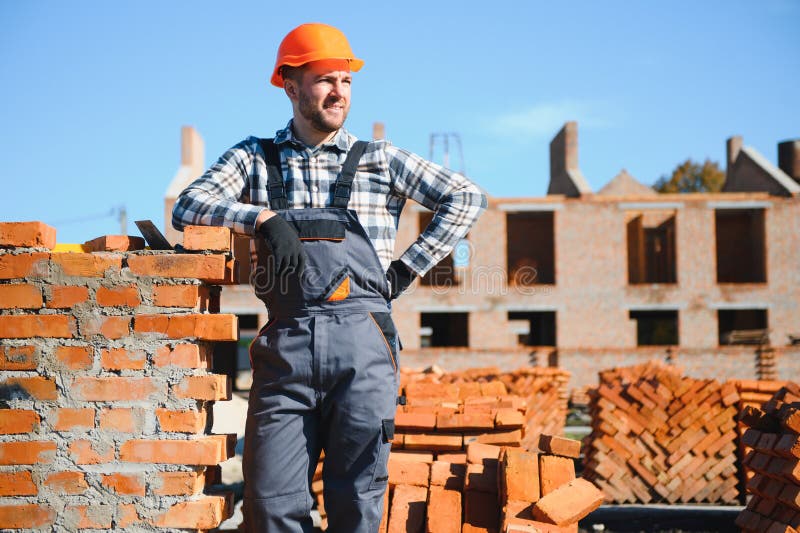 Construction Worker in Uniform and Safety Equipment Have Job on ...