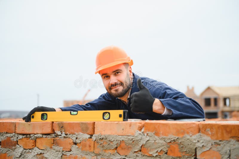 Construction Worker in Uniform and Safety Equipment Have Job on ...