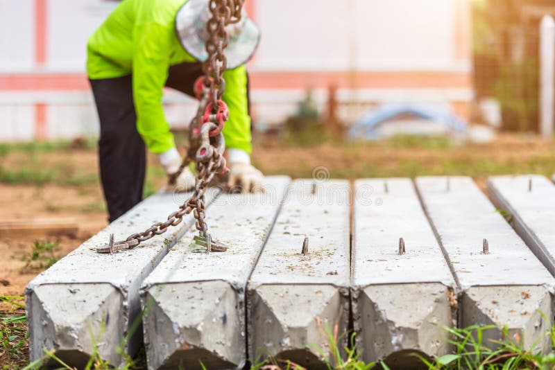 Unloading of Concrete High-voltage Poles at the Construction Site Using ...