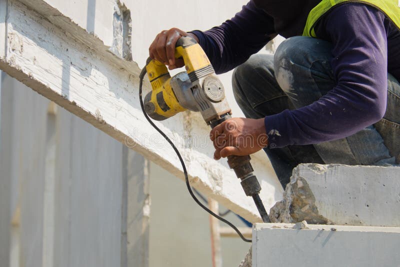 Construction Worker Use Electric Drill Drilling Concrete Wall in ...