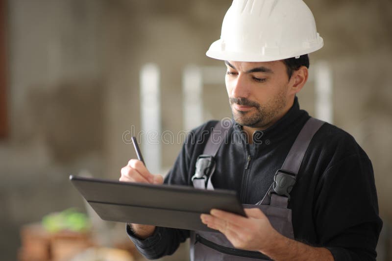 Construction Worker Using Digital Tablet To Take Notes Stock Image ...